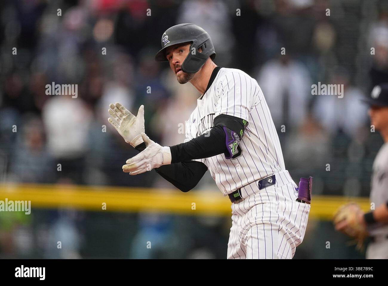 Colorado Rockies center fielder Brenton Doyle (9) gestures to the ...