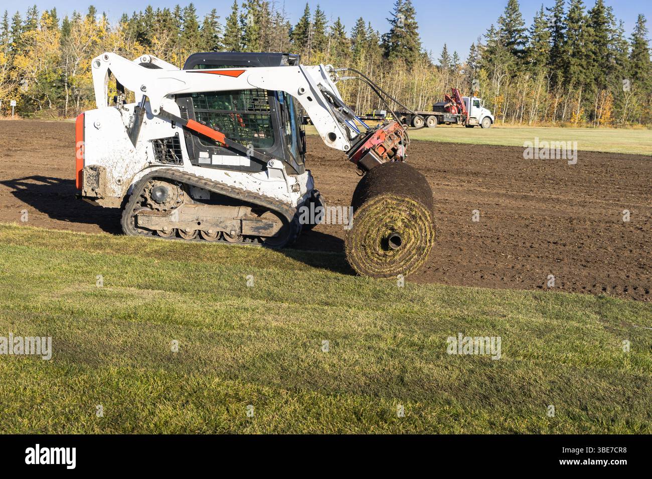 Lawn installation using sod rolls hi-res stock photography and images ...