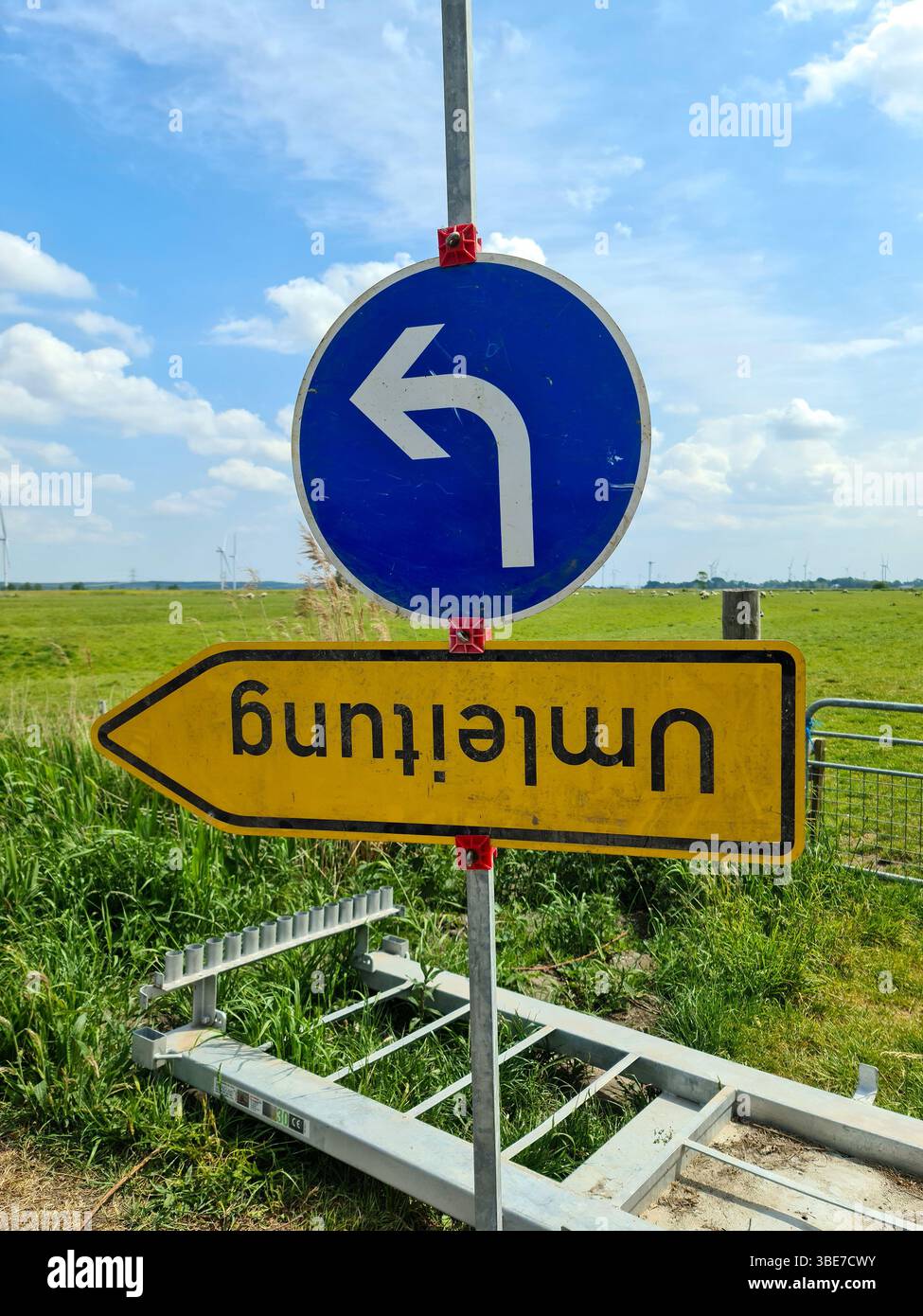 Detour sign showing direction for a left turn, with the german word ...