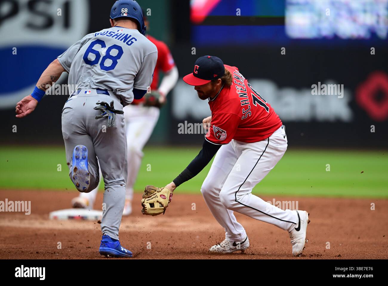 Cleveland Guardians second baseman Daniel Schneemann prepares to tag ...