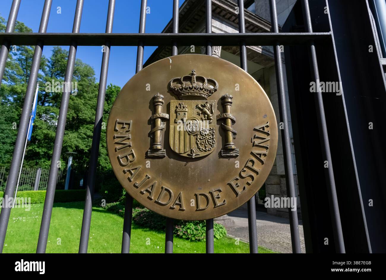 Close-up of the official seal of the Spanish Embassy on a metal gate in ...