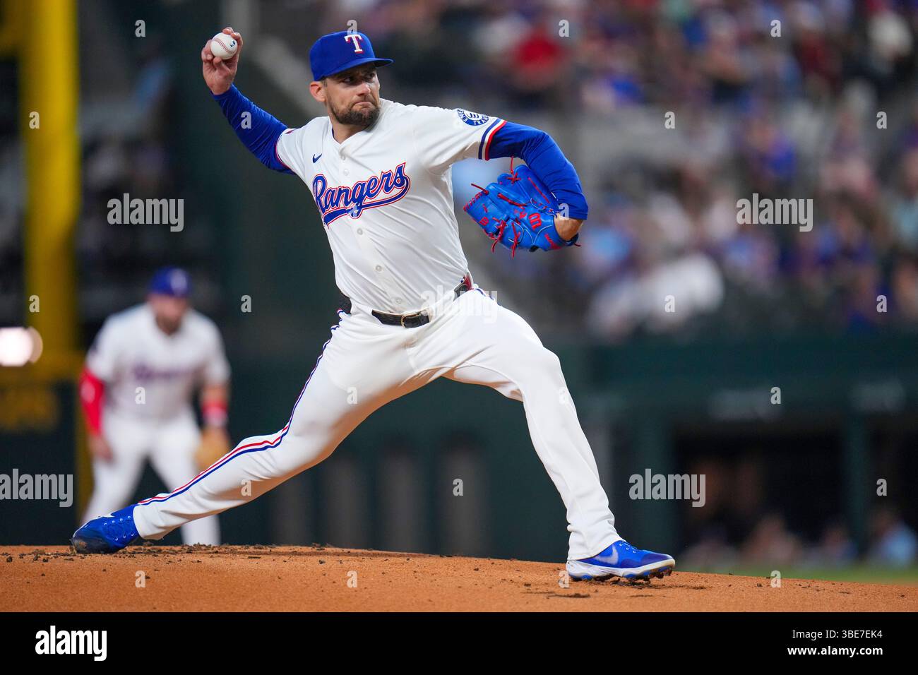 Texas Rangers Starting Pitcher Nathan Eovaldi Throws A Pitch To The