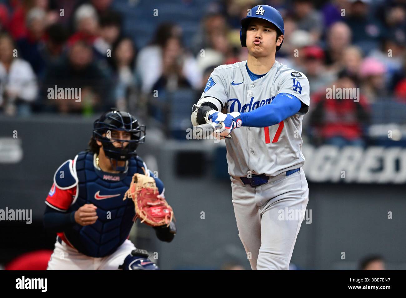 Los Angeles Dodgers' Shohei Ohtani reacts after striking out during the ...