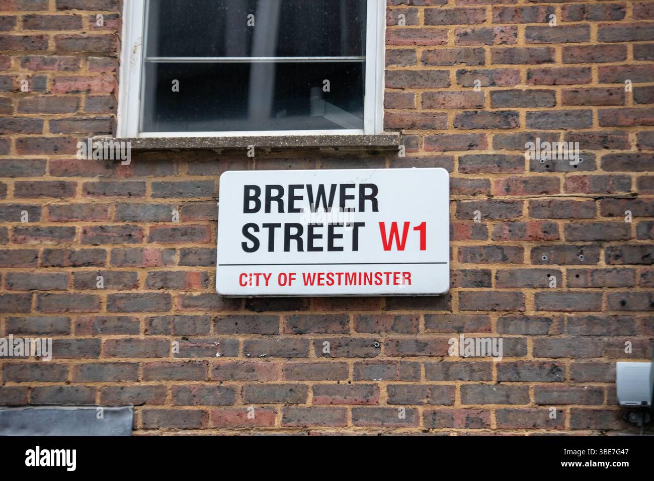 Street sign for Brewer Street in the City of Westminster, London. The ...
