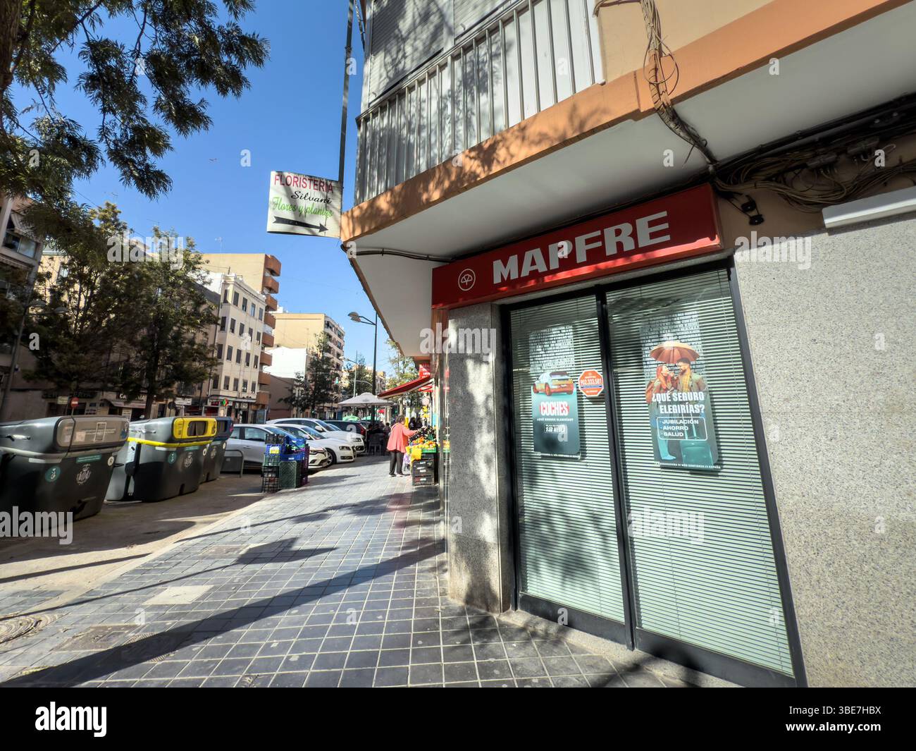 VALENCIA, SPAIN - APRIL 15, 2025: The red Mapfre logo crowns a glass ...