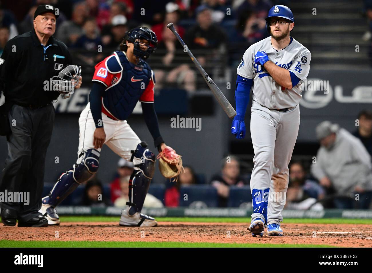 Los Angeles Dodgers' Max Muncy tosses his bat after hitting a three-run ...
