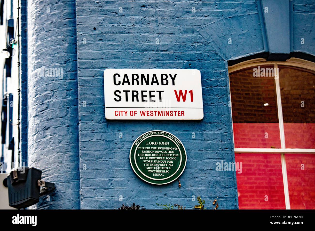 Street sign on Carnaby Street in the City of Westminster, London. Blue ...