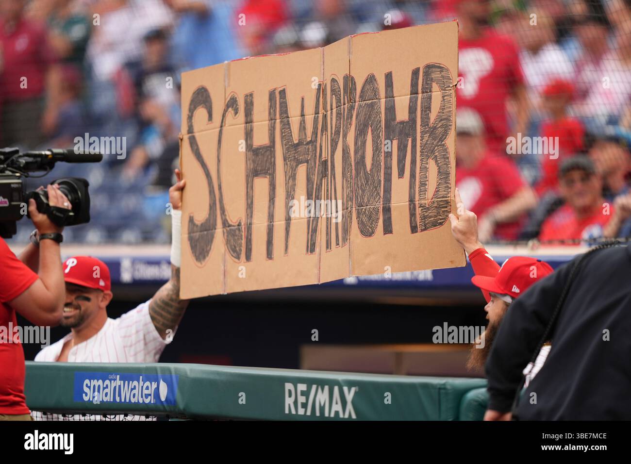 Philadelphia Phillies' Nick Castellanos and Brandon Marsh hold up a ...