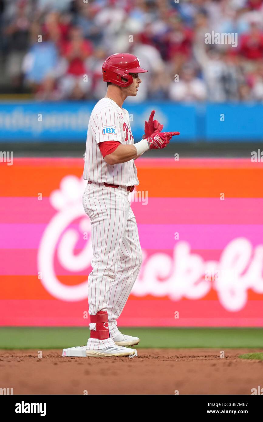 Philadelphia Phillies' Max Kepler reacts after hitting a run-scoring ...