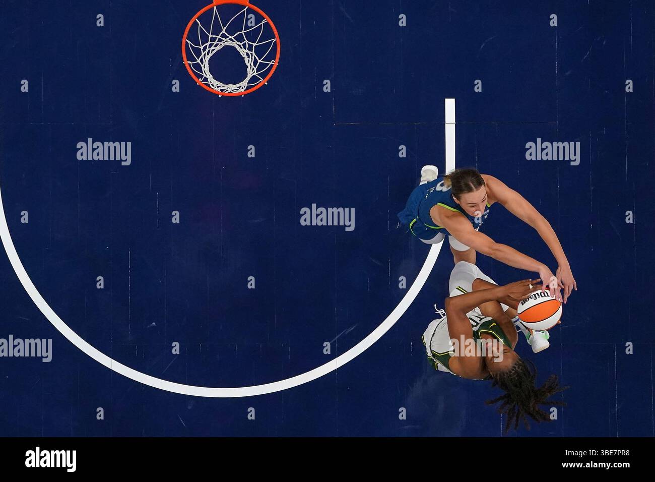 Minnesota Lynx forward Alanna Smith (8), top, blocks a shot by Seattle ...