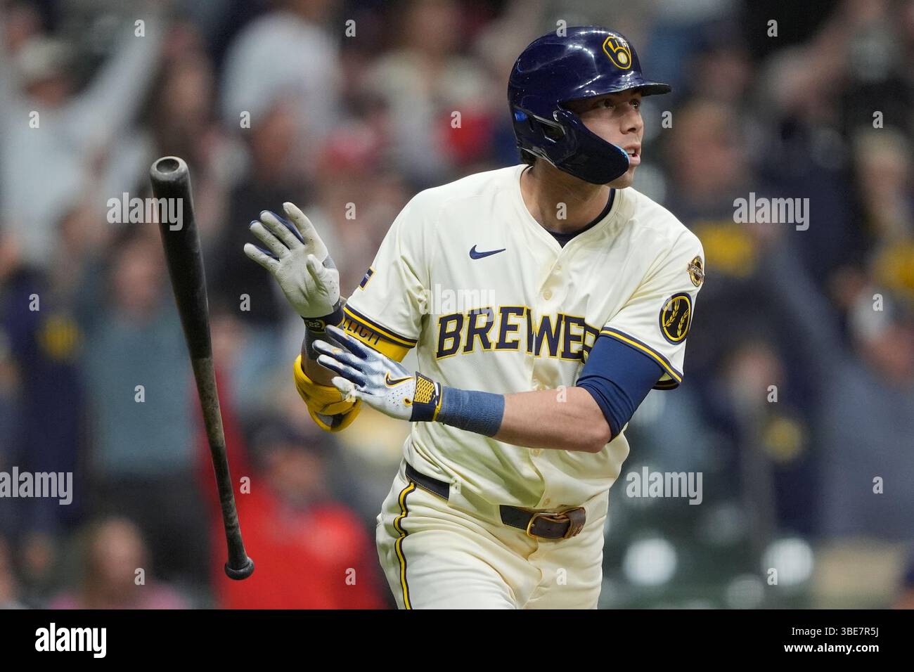 Milwaukee Brewers' Christian Yelich drops his bat after hitting a walk ...