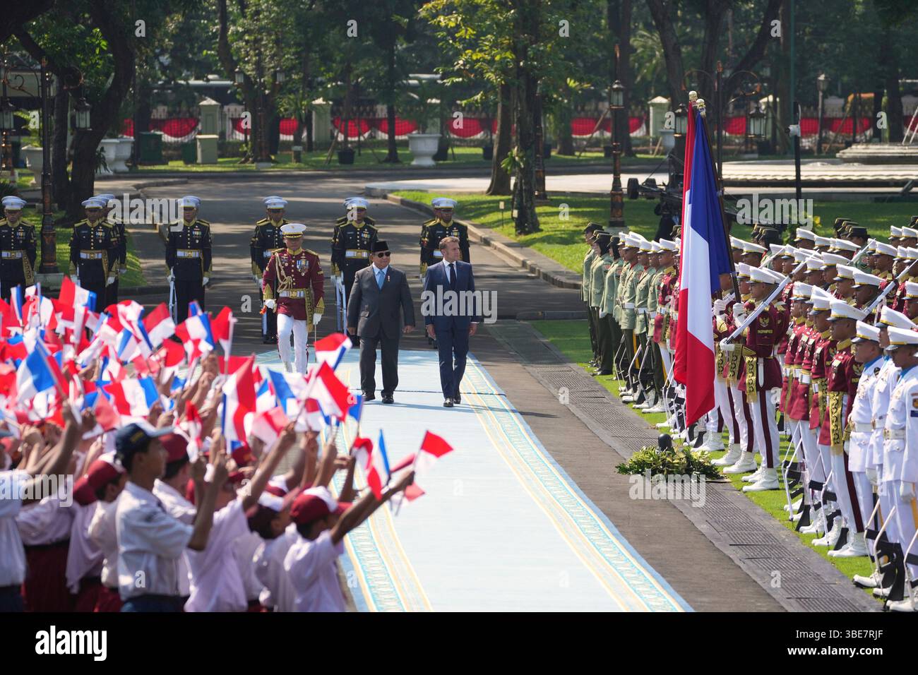 French President Emmanuel Macron, center right, and Indonesian ...