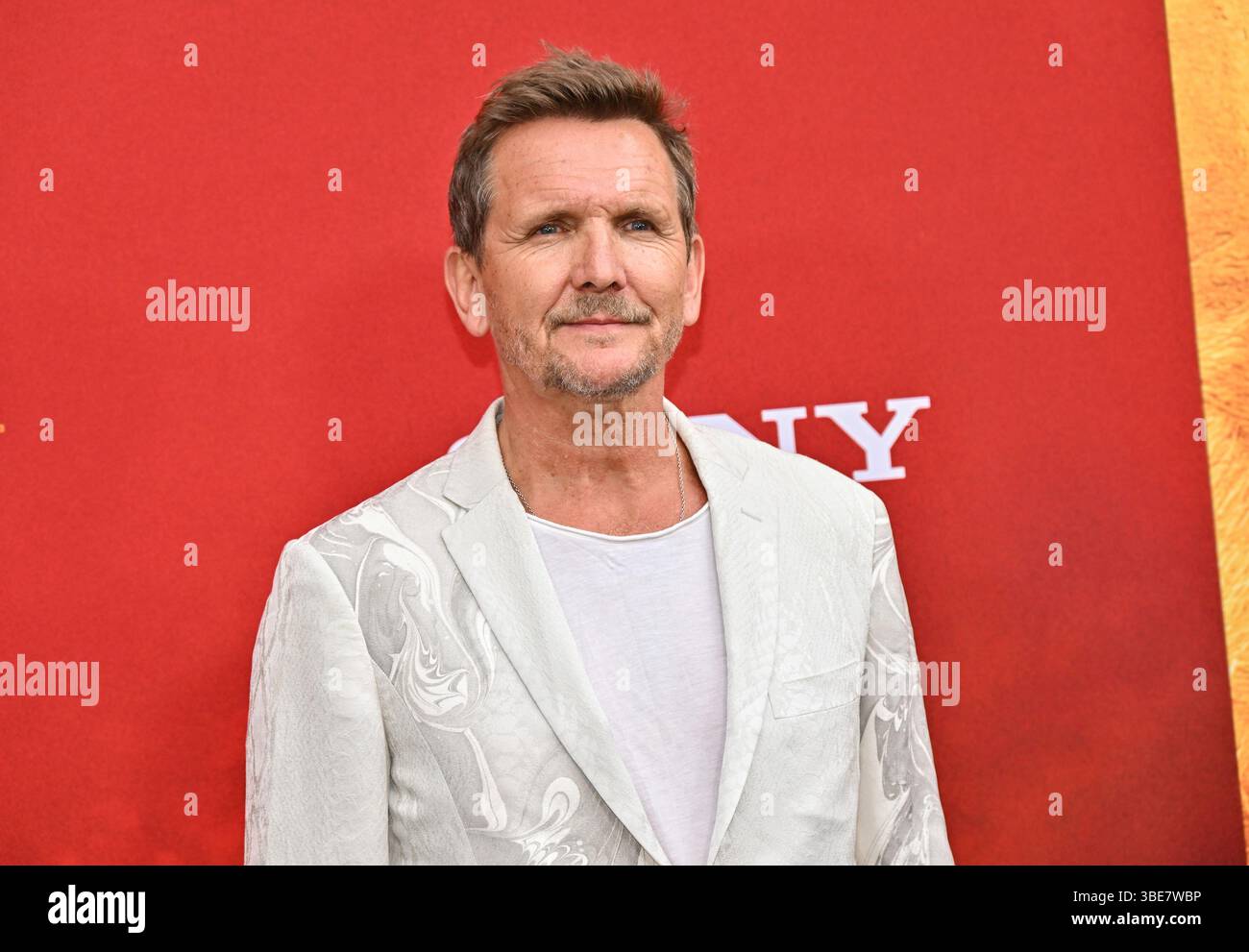 Sebastian Roche attends the world premiere of "Karate Kid: Legends" at ...