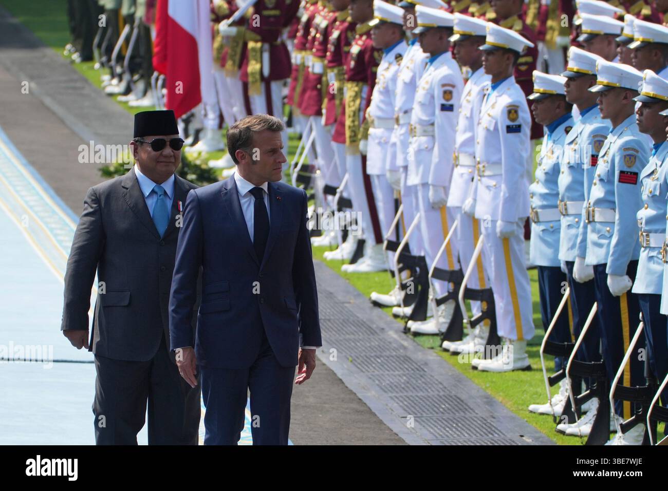 French President Emmanuel Macron, second left, and Indonesian President ...