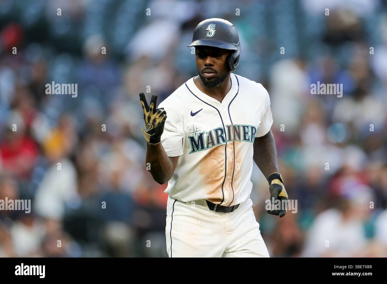 Seattle Mariners' Randy Arozarena gestures after drawing a walk during ...
