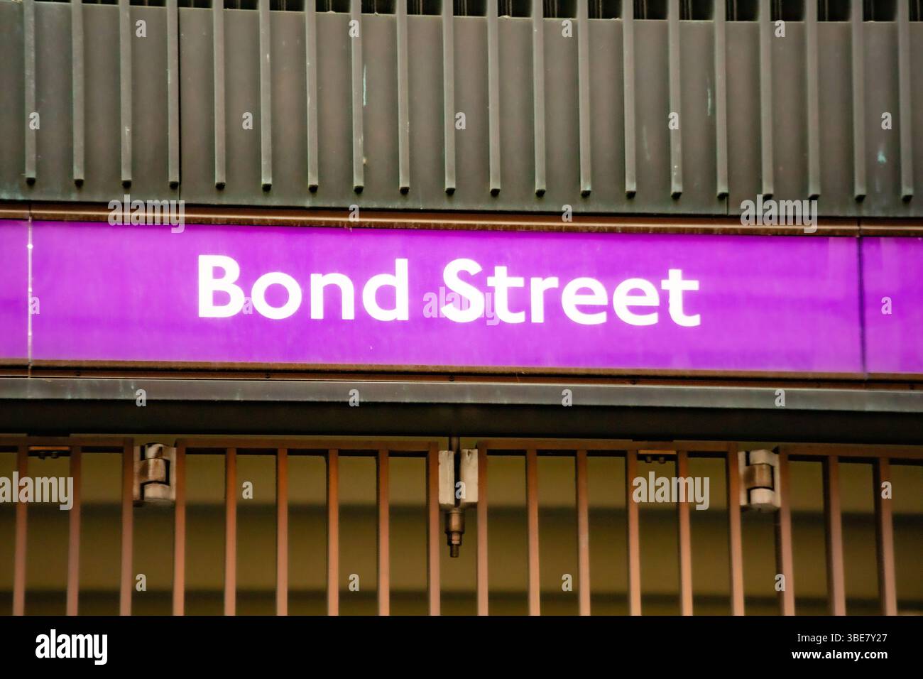Close-up of Bond Street station sign in London. The signage is purple ...