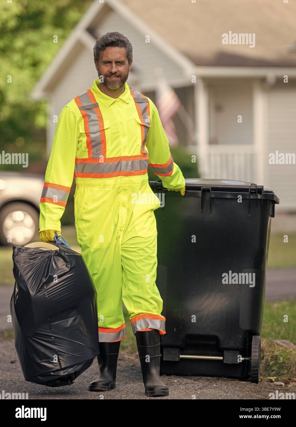 Picking up garbage plastic for cleaning. Keeping garbage plastic into ...
