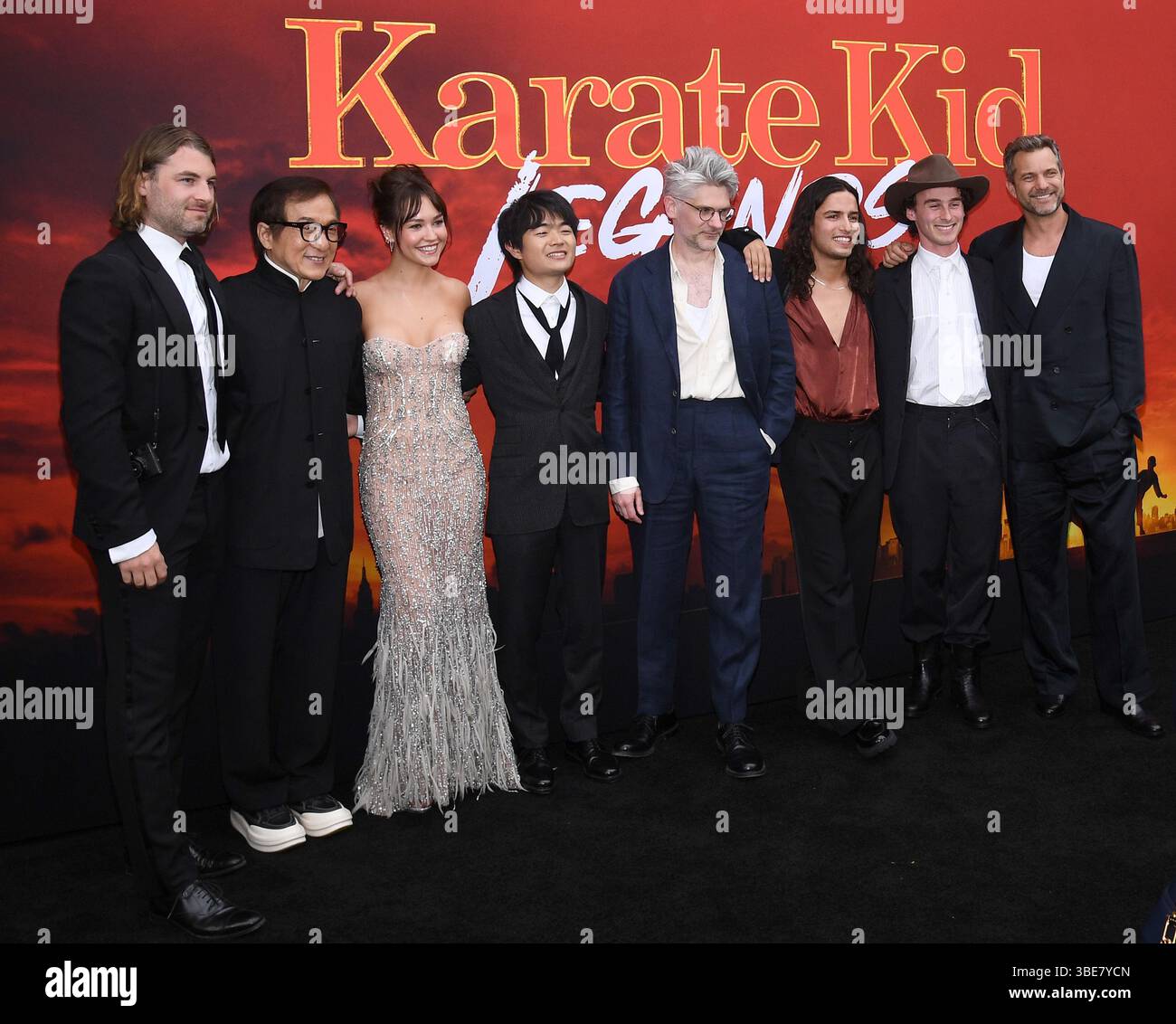 New York, USA. 27th May, 2025. (L-R) Justin Brown, Jackie Chan, Sadie ...
