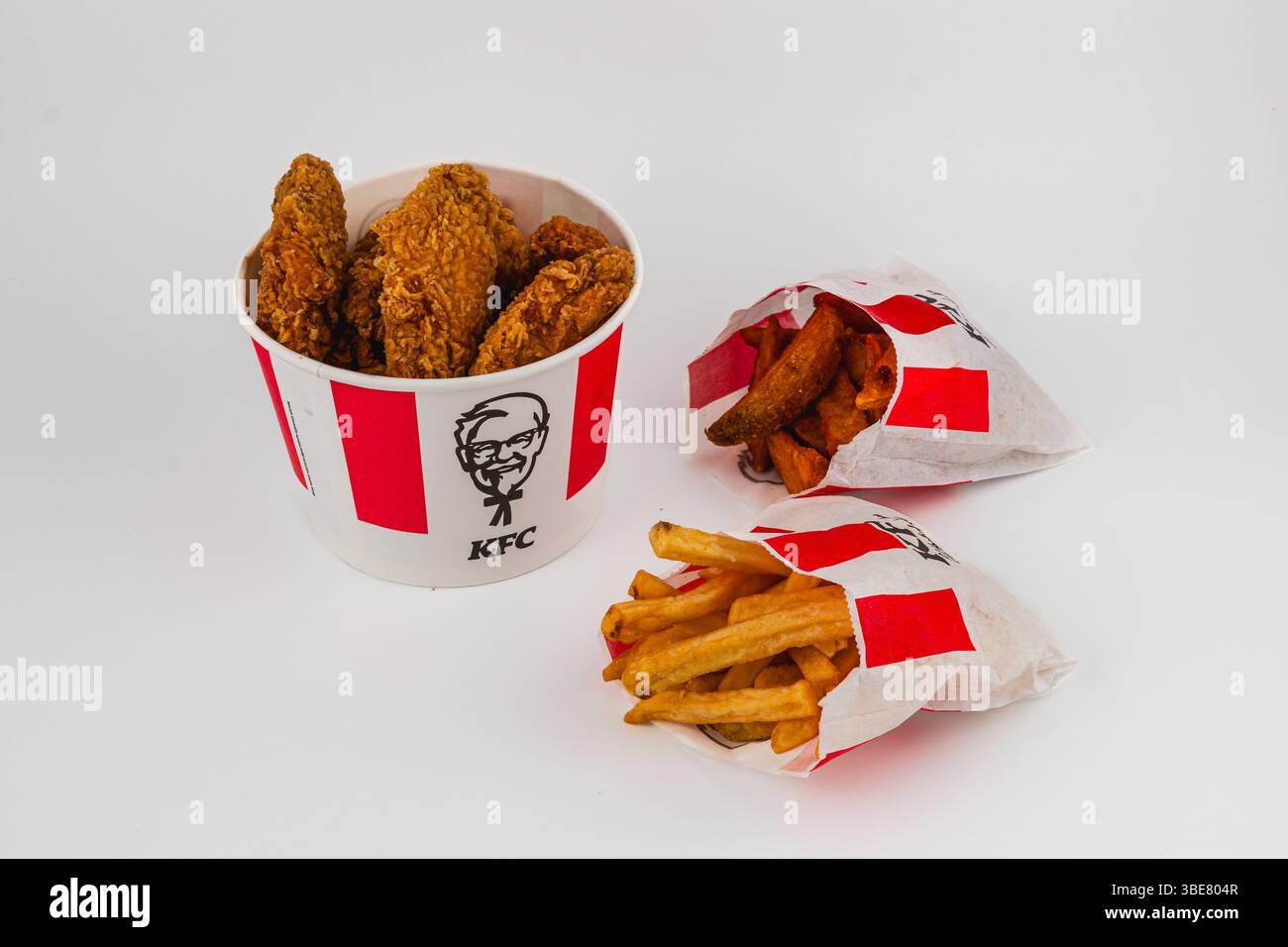 Lviv Ukraine 05.21.25 A bucket filled with crispy fried chicken is ...