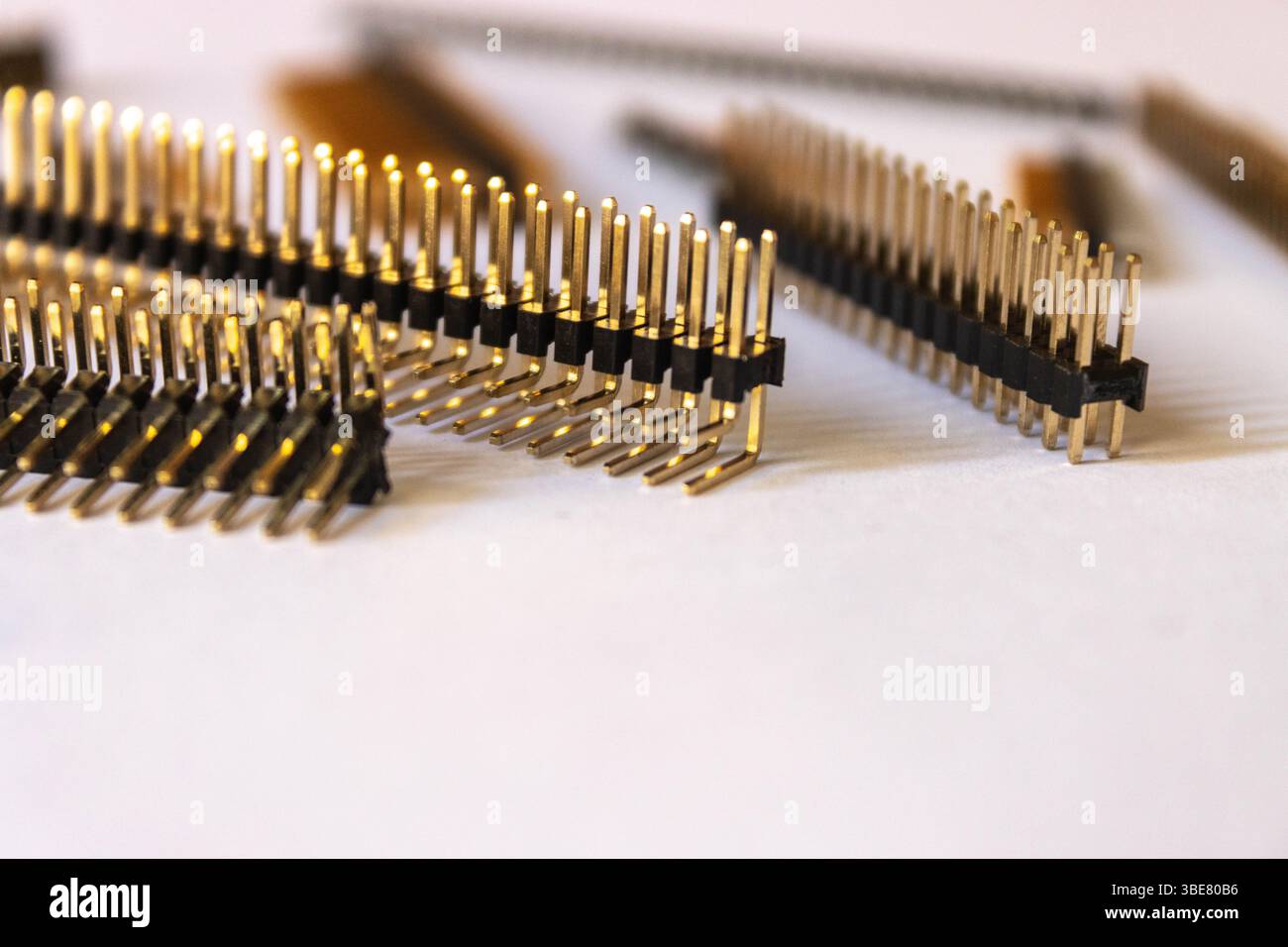 Gold header pins for electronics and PCB connection Stock Photo - Alamy