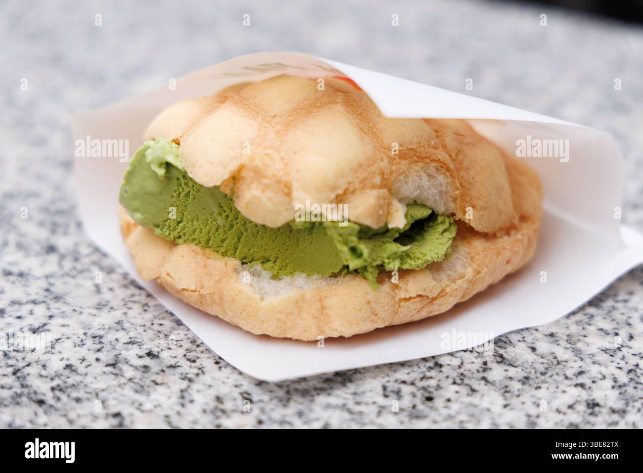 Melon bread ice cream in Dotonbori Stock Photo - Alamy