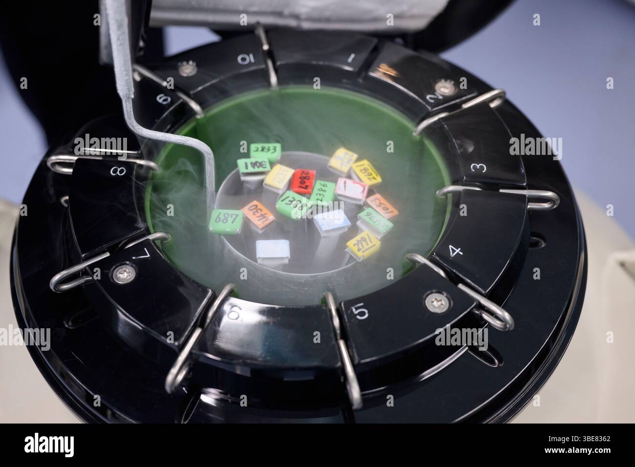 Researcher testing liquid sample hi-res stock photography and images ...