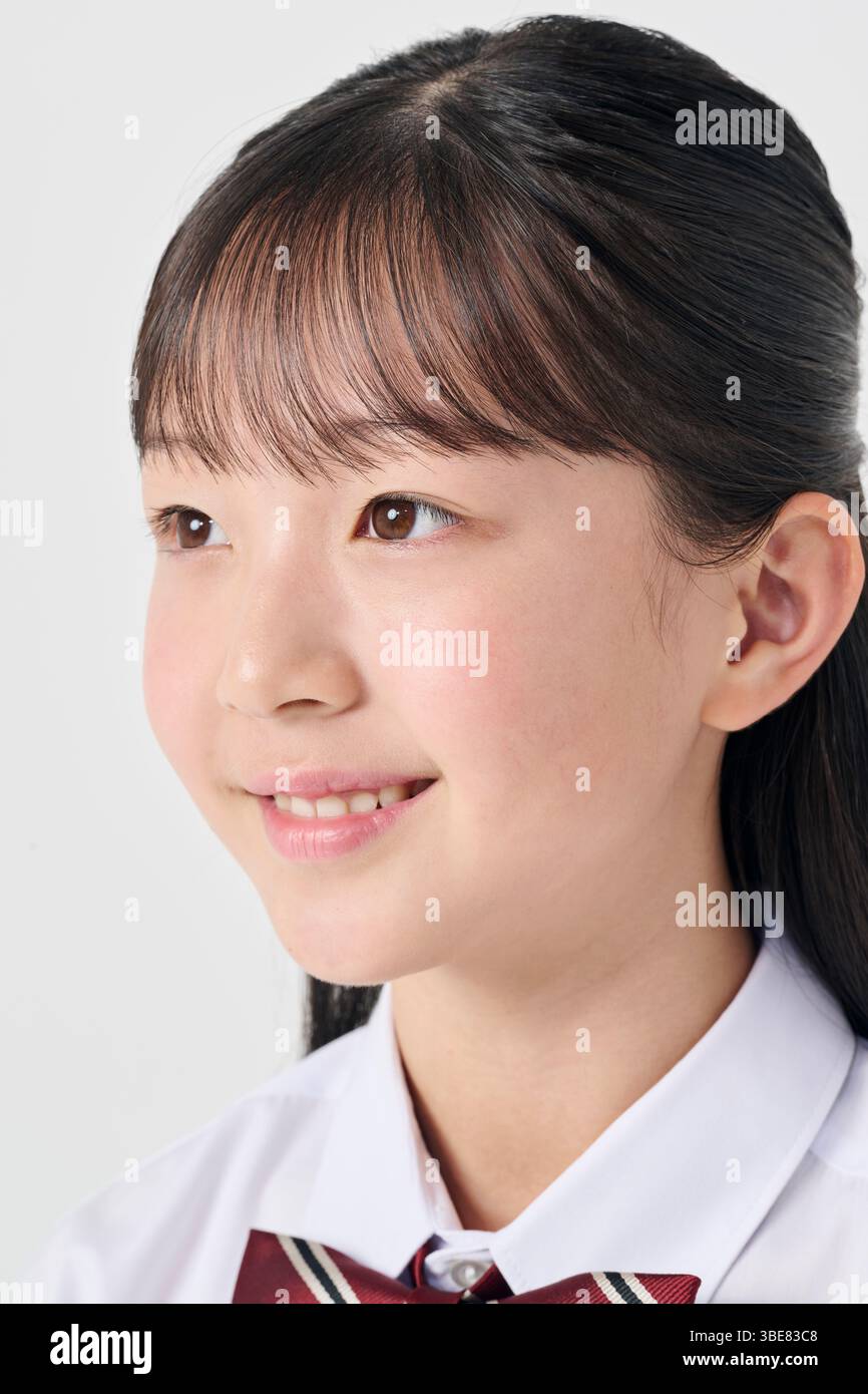 White background, Japanese Junior High School Girl, smiling Stock Photo ...
