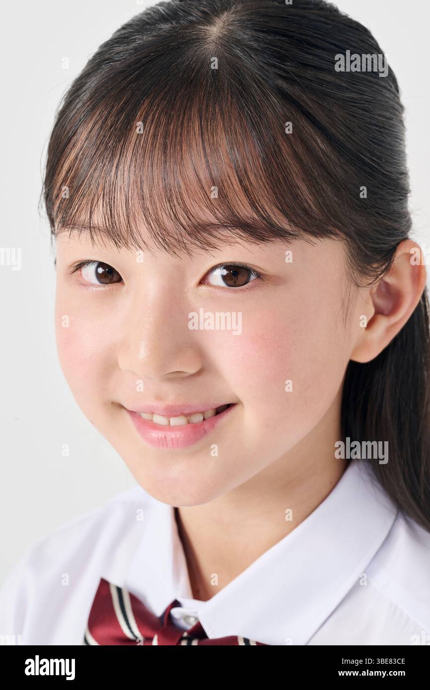 White background, Japanese Junior High School Girl, smiling Stock Photo ...