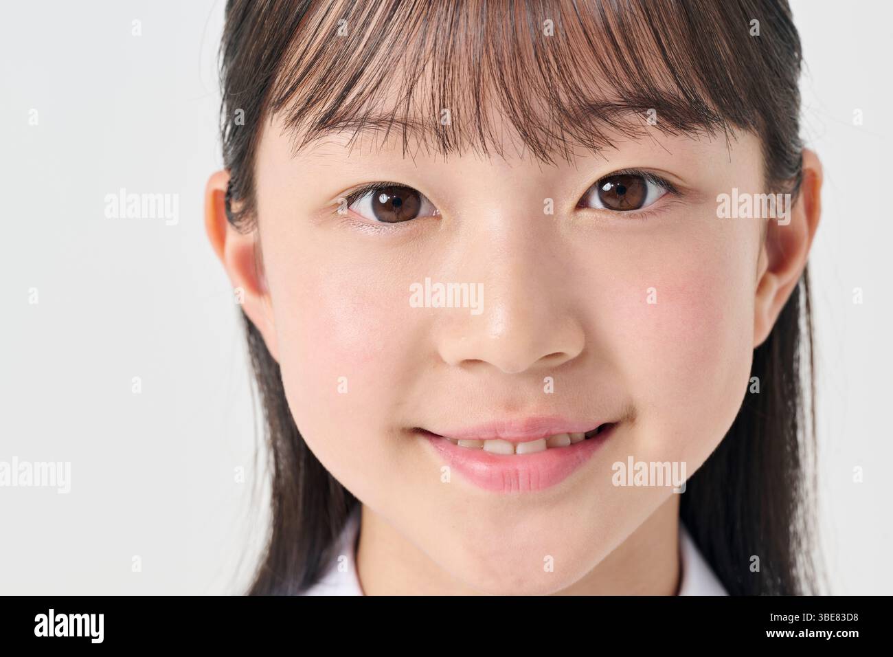 White background, Japanese Junior High School Girl, smiling Stock Photo ...