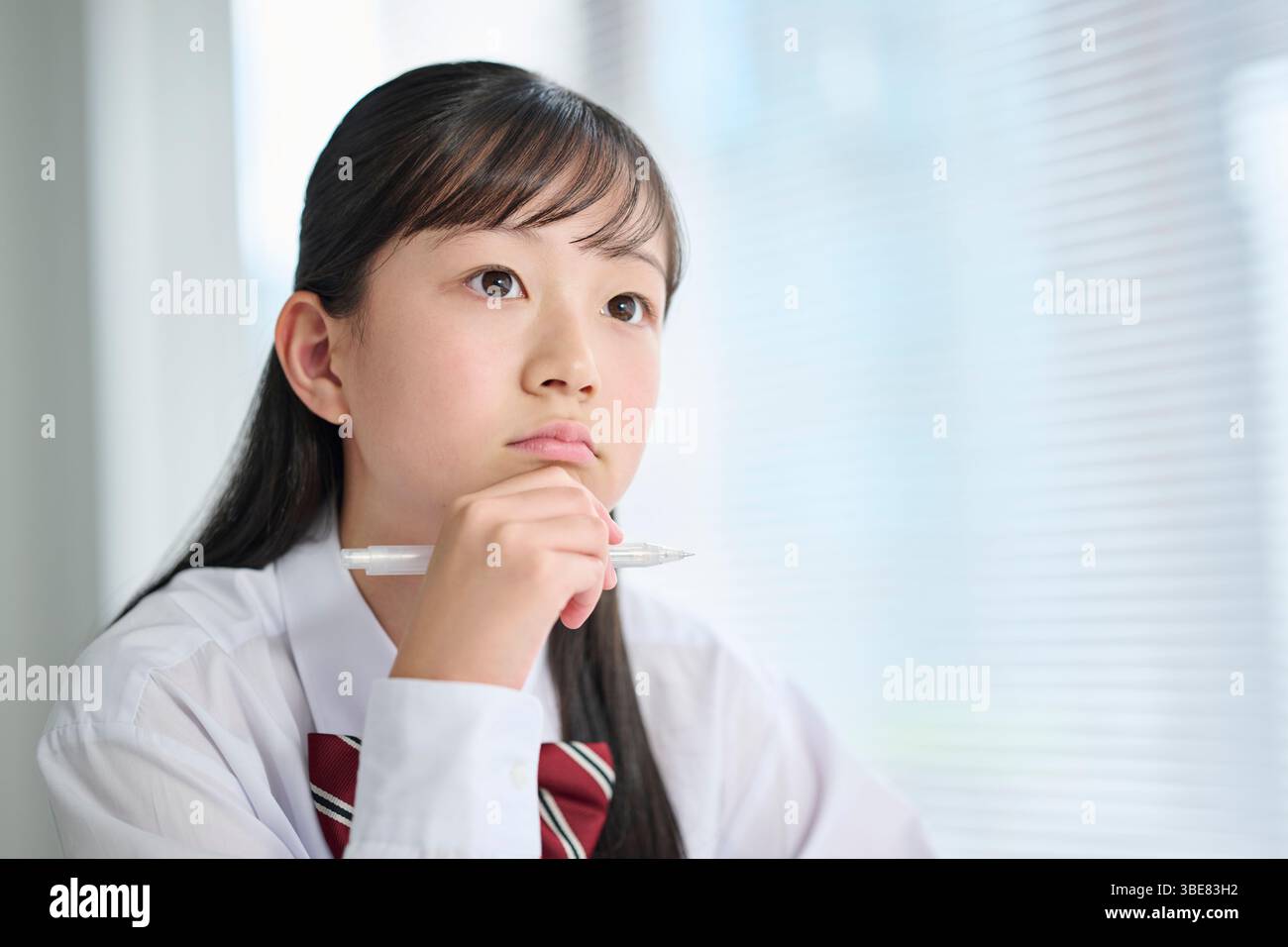 Junior high school girls taking a class in a classroom Stock Photo - Alamy