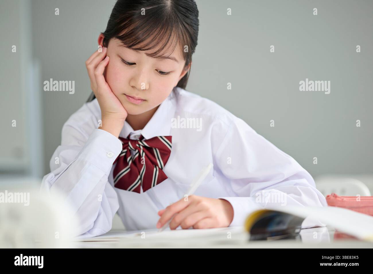 Junior high school girls taking a class in a classroom Stock Photo - Alamy
