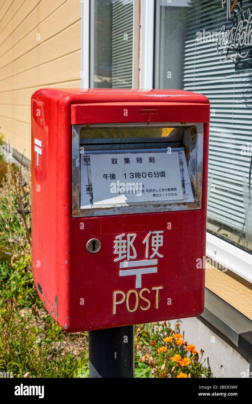 Post box next to a convenience store in Oniwaki, Rishiri Island Stock ...