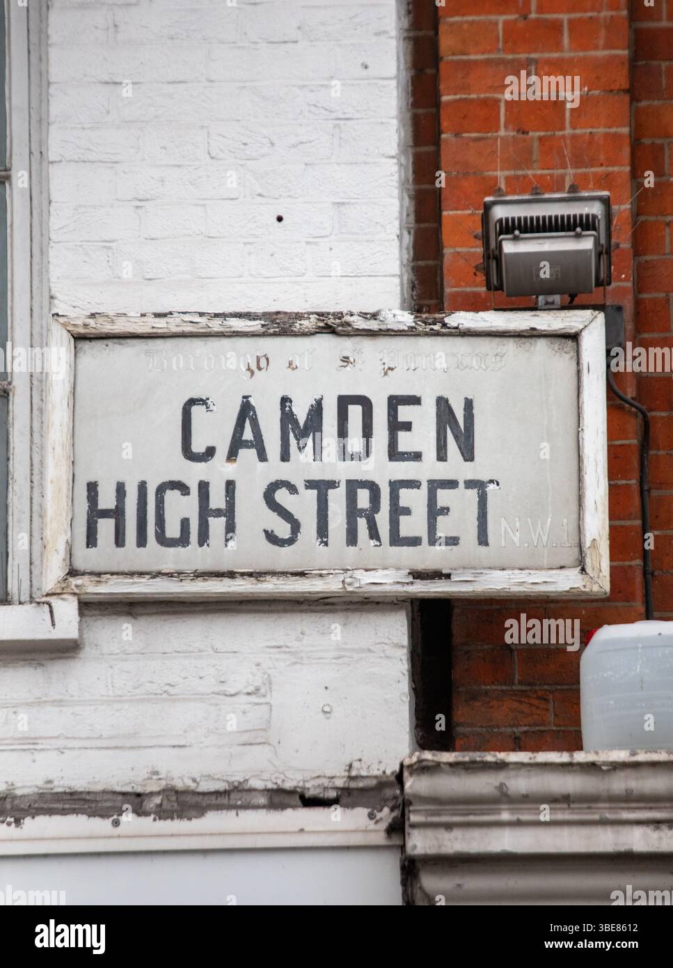 A close-up of the Camden High Street sign on a brick wall in London ...