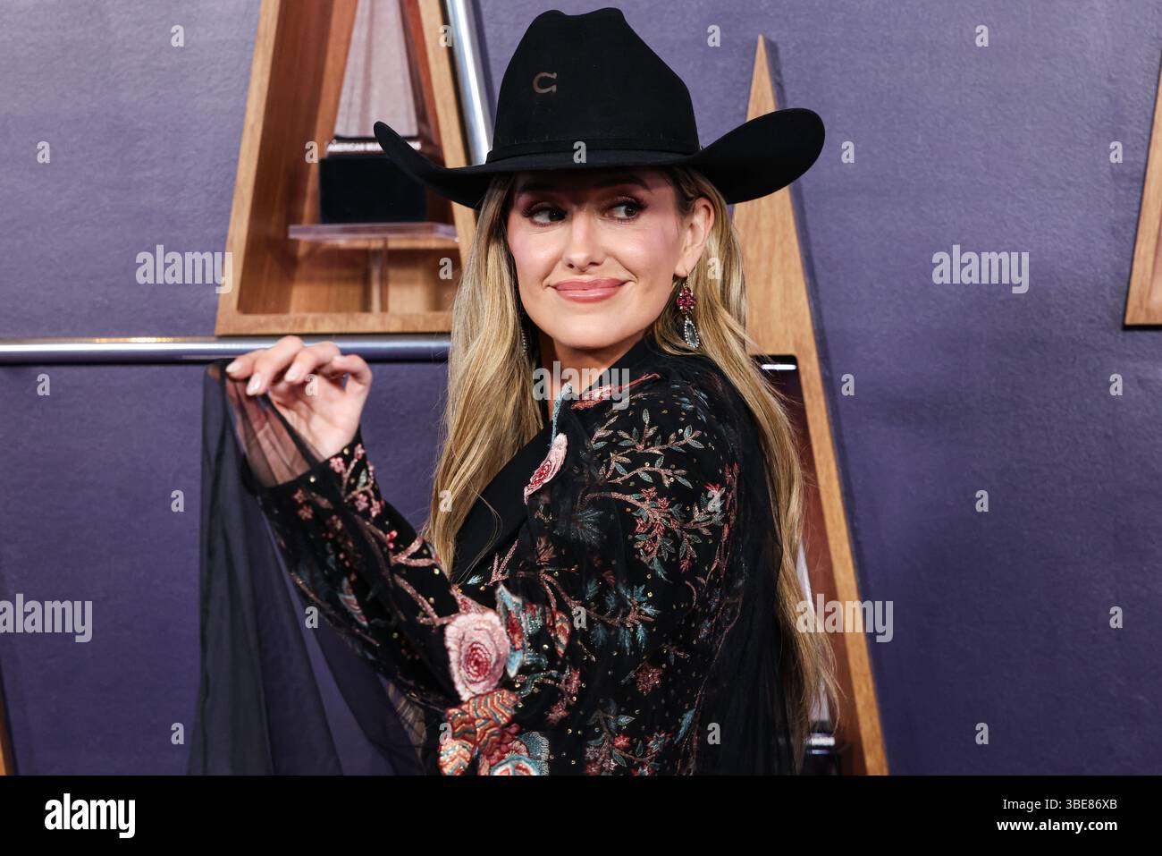 LAS VEGAS, NEVADA, USA - MAY 26: Lainey Wilson wearing Rahul Mishra ...