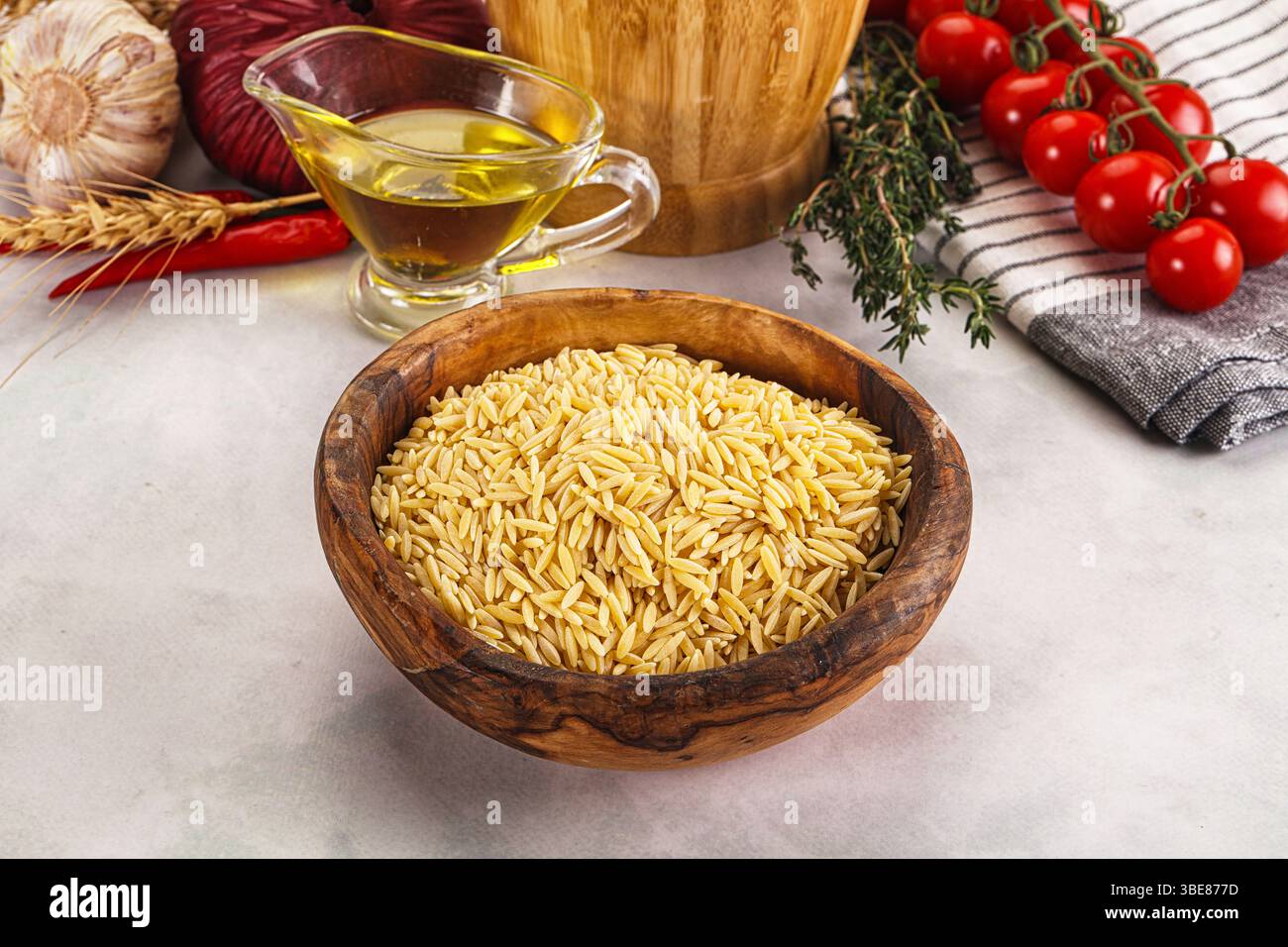 Italian raw dry pasta risoni for cooking Stock Photo - Alamy