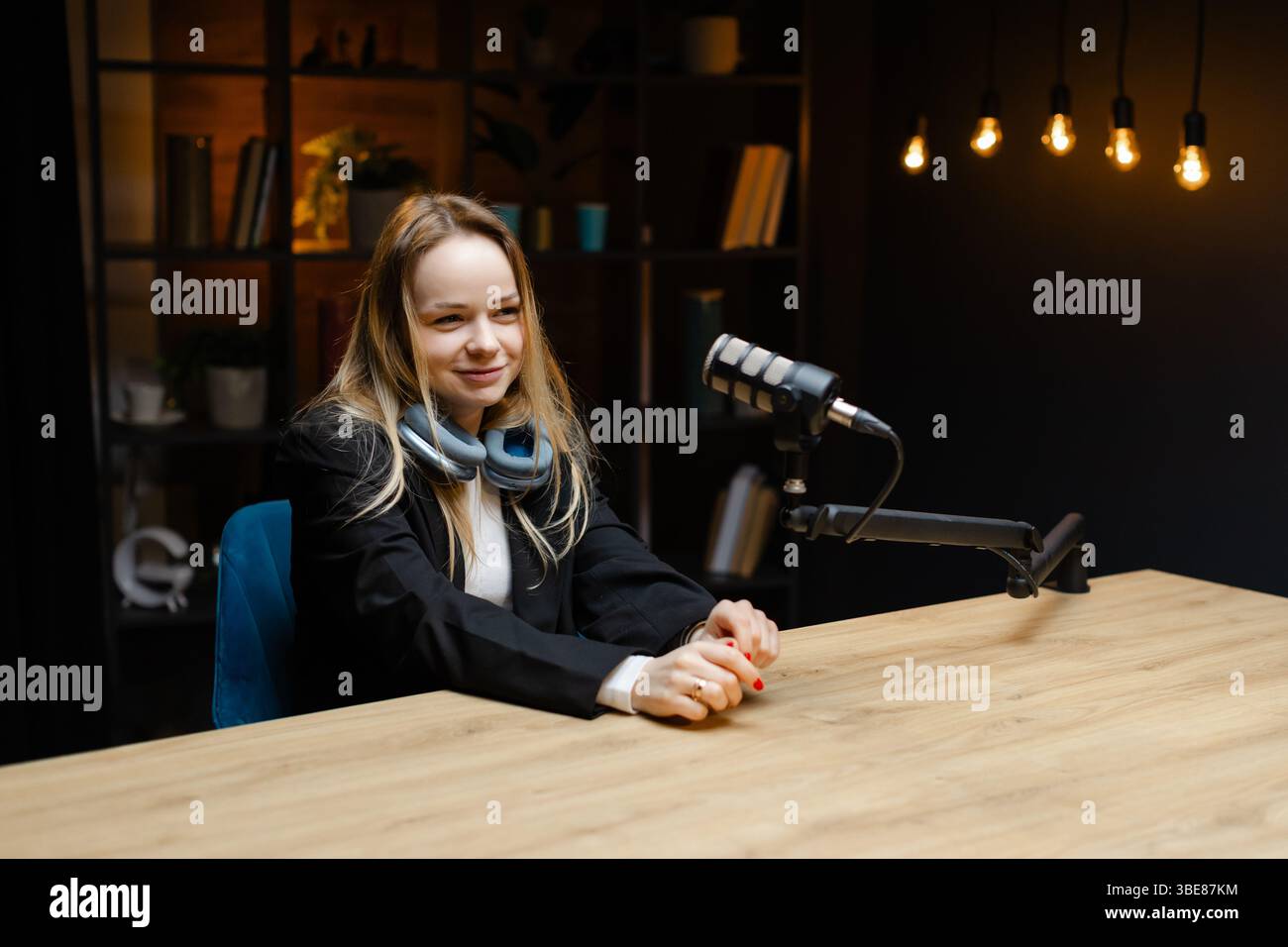 Engaging conversation in podcast studio hi-res stock photography and ...