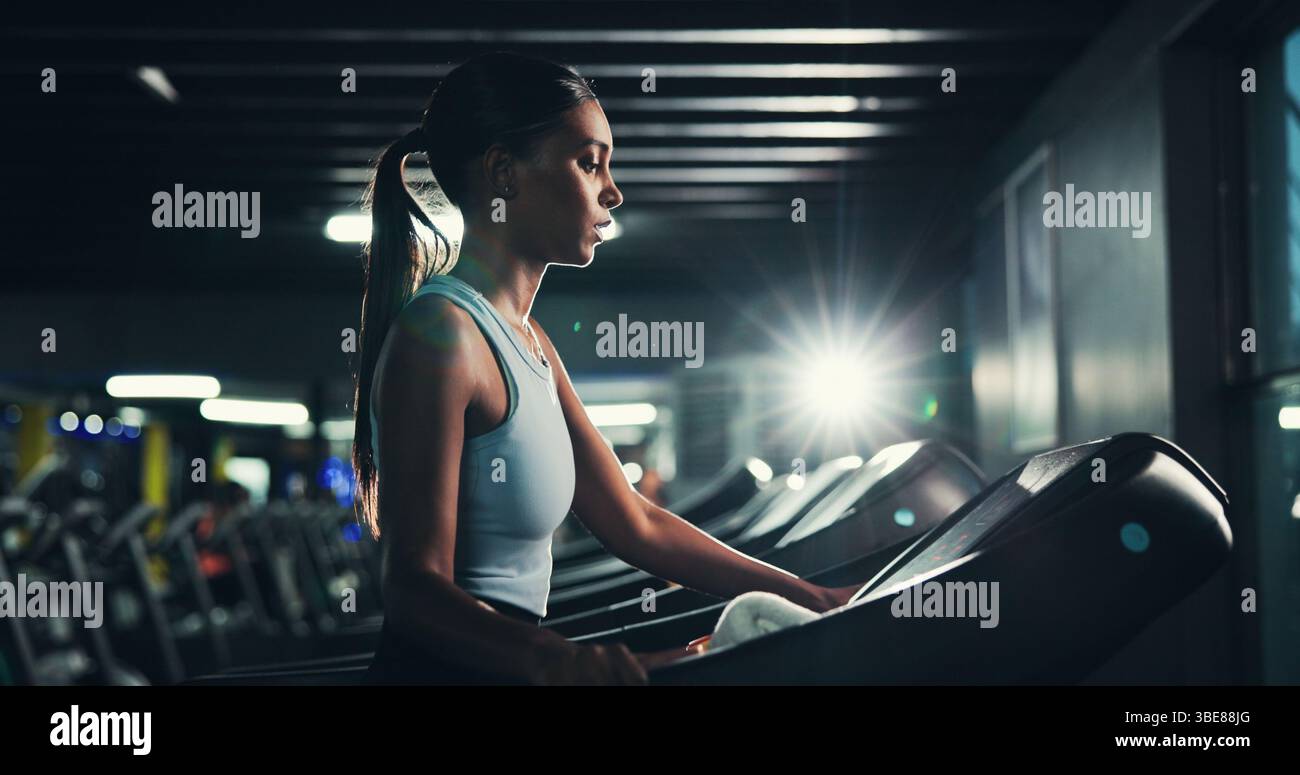 Fitness, profile and treadmill with woman in gym for cardio training or ...