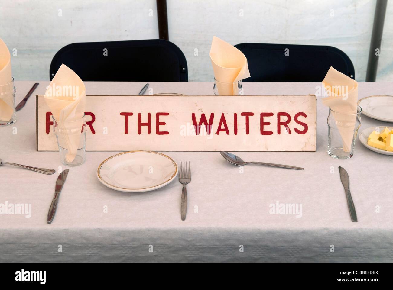 Table place setting, For The Waiters at a village community end of ...