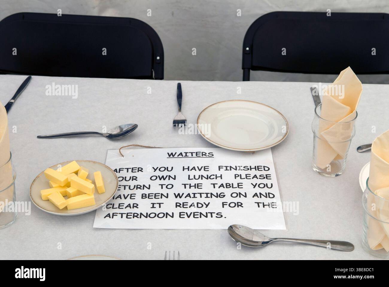 Table place settings, For The Waiters at a village community end of ...