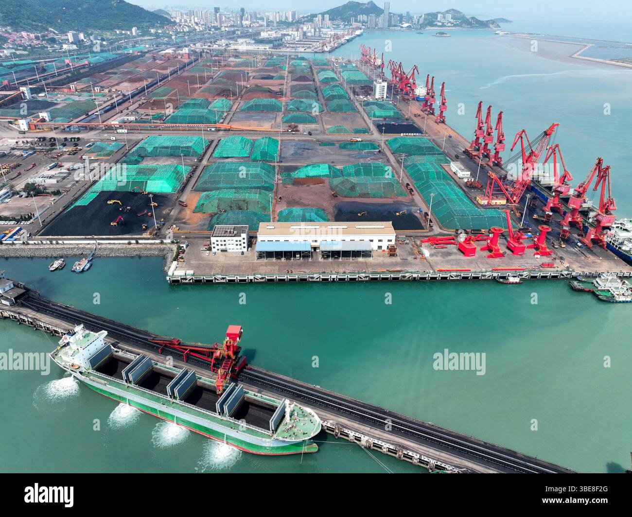 Aerial photo shows the ship unloading coals at Lianyungang Port in ...