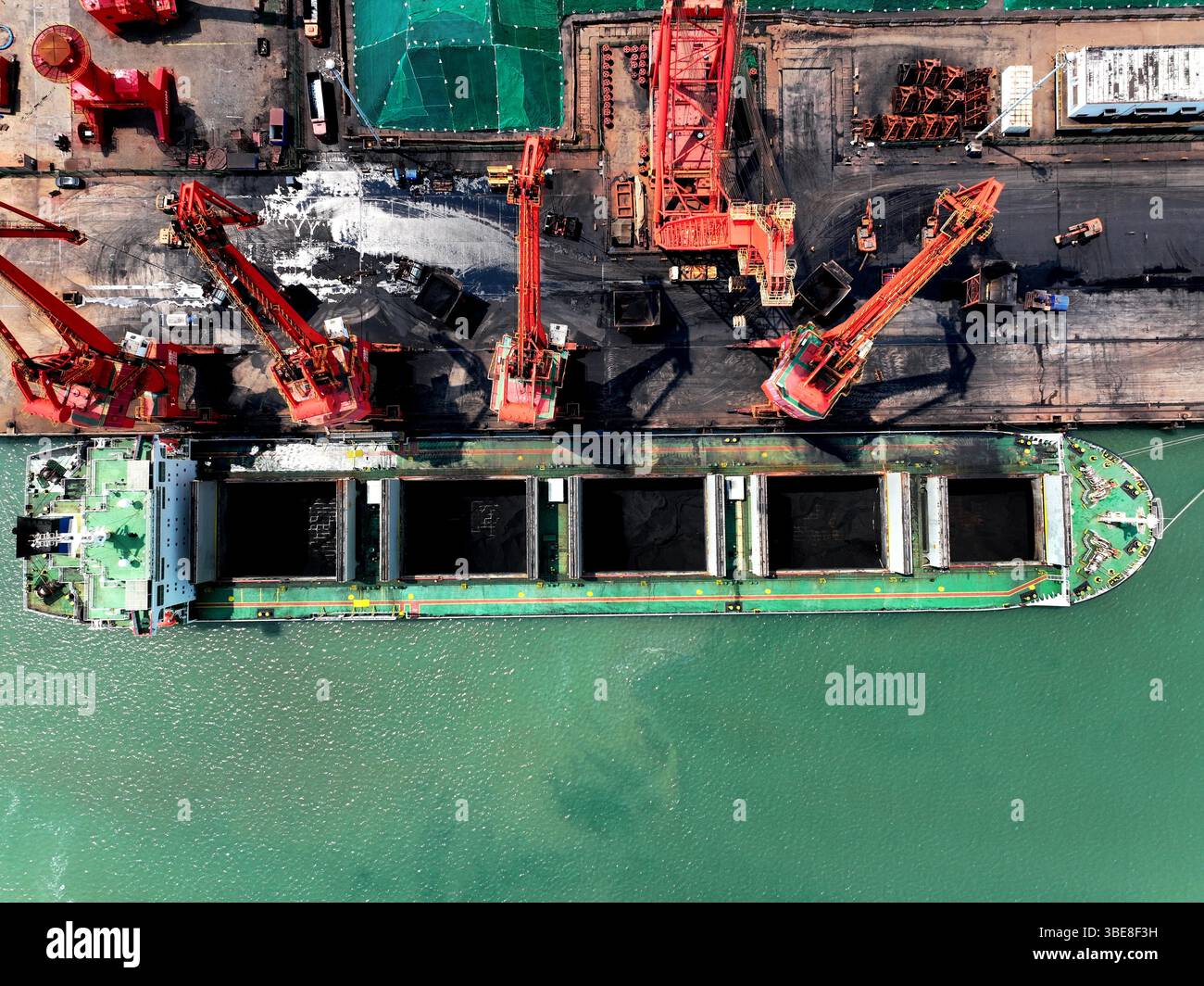 Aerial photo shows the ship unloading coals at Lianyungang Port in ...
