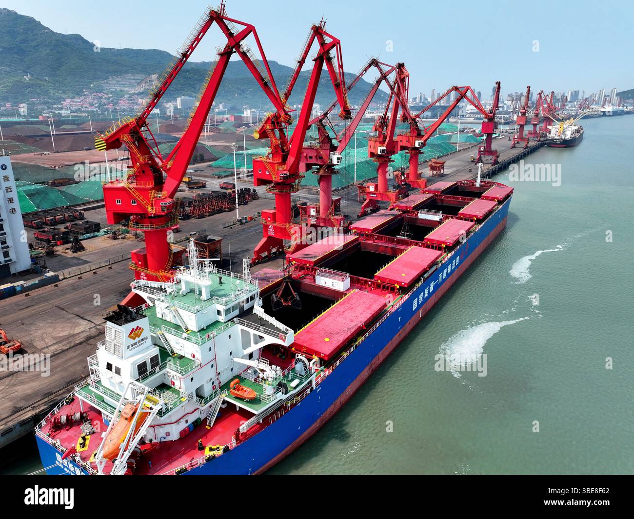 Aerial photo shows the ship unloading coals at Lianyungang Port in ...