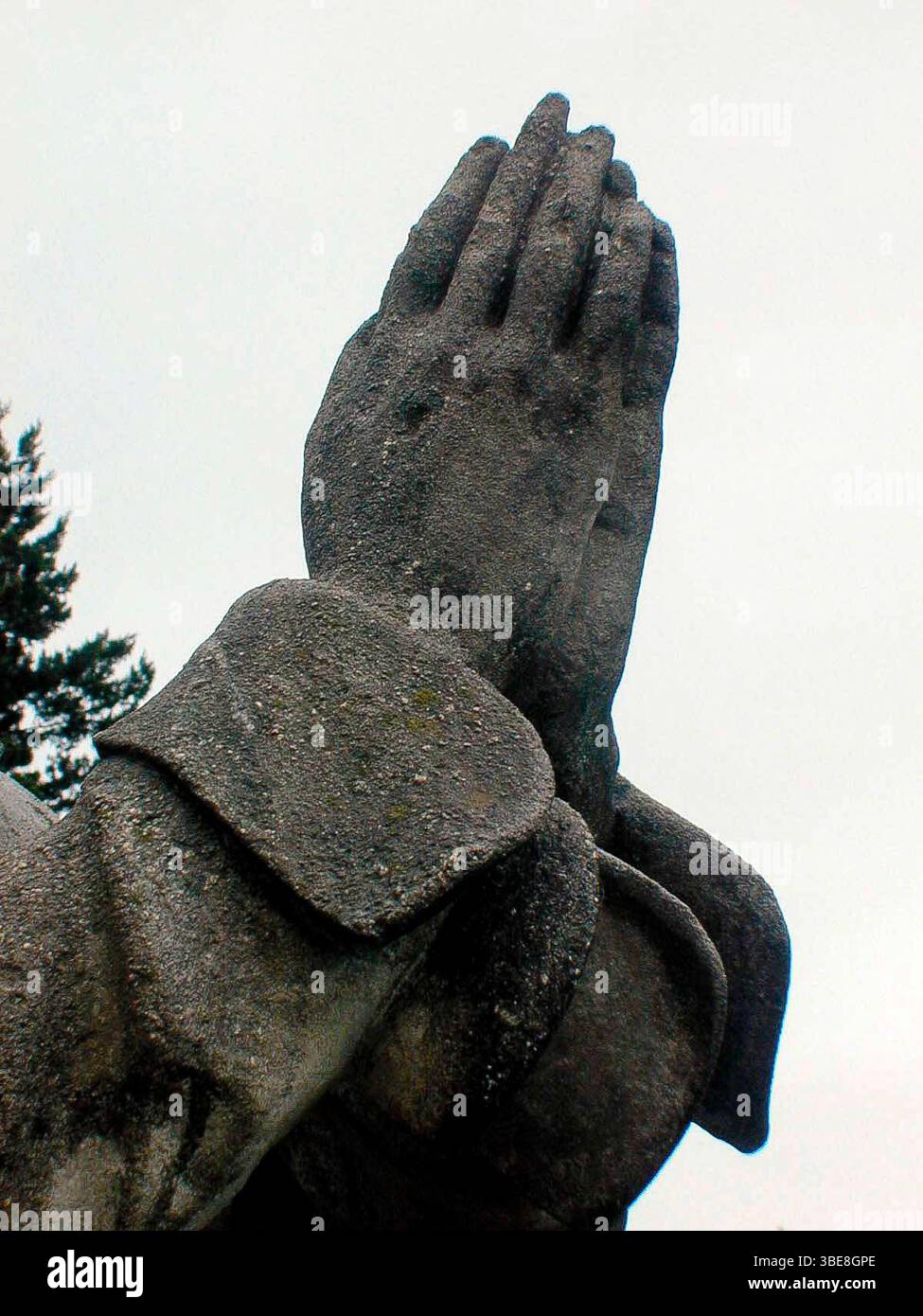 person holding hands in prayer, religious symbol of faith and devotion ...