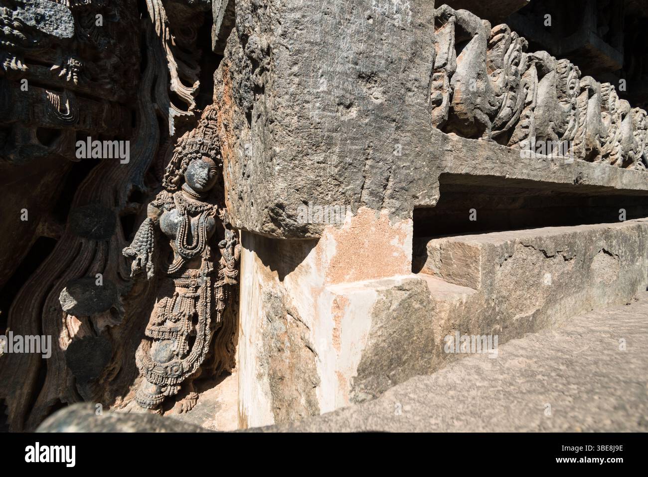 Beautiful sculpture of a Hindu deity with ornamental carvings at the ...