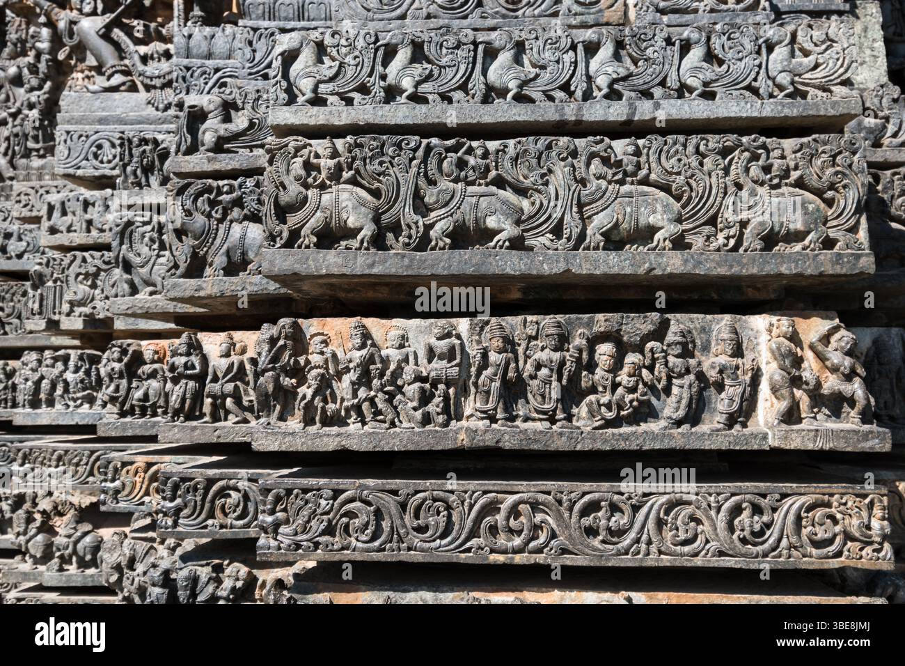 Beautiful stone carvings on the wall of the ancient Hoysaleshwara ...