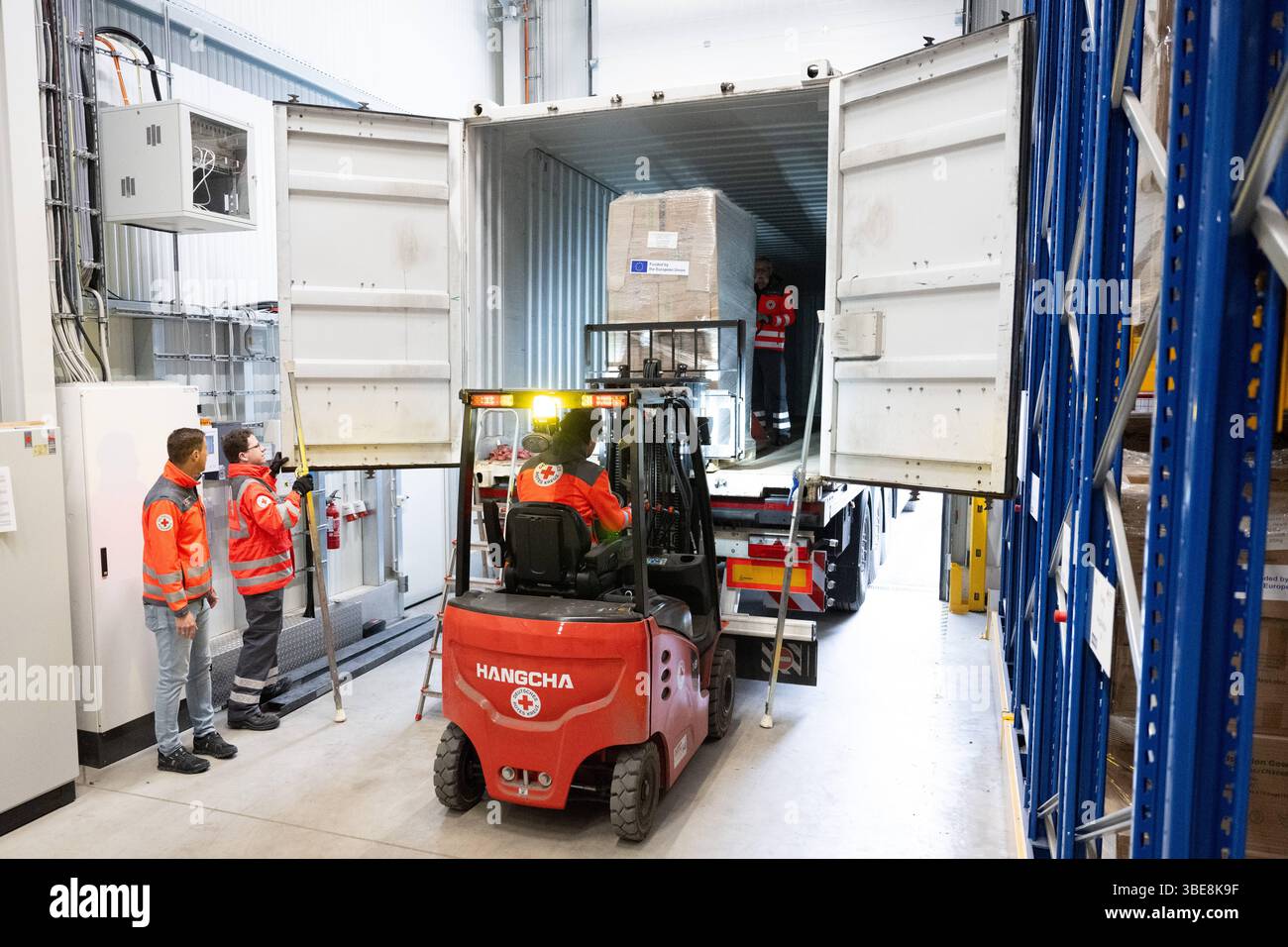Dresden, Germany. 28th May, 2025. Protective clothing is loaded onto a ...