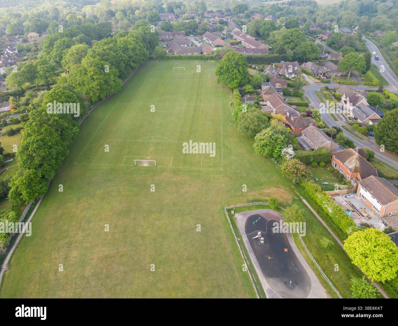 aerial view of the recreation ground and village of Balcombe in west ...