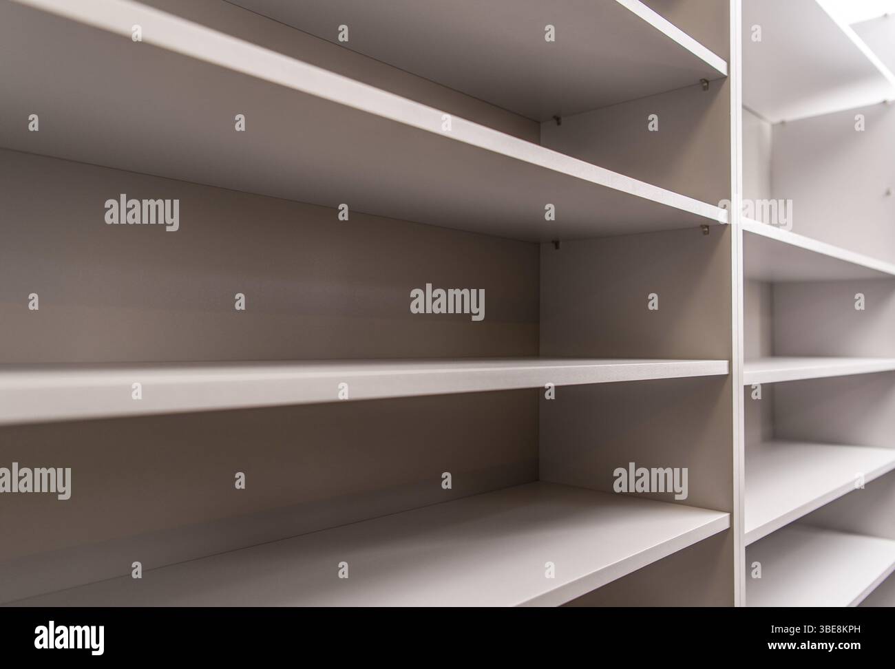 Modern shelving unit features sleek design and empty shelves, perfect ...