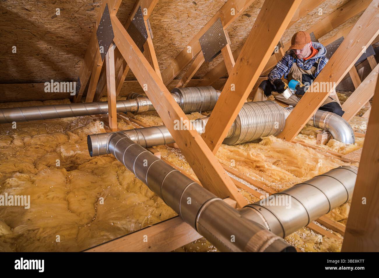 Worker fixing ventilation ducts hi-res stock photography and images - Alamy