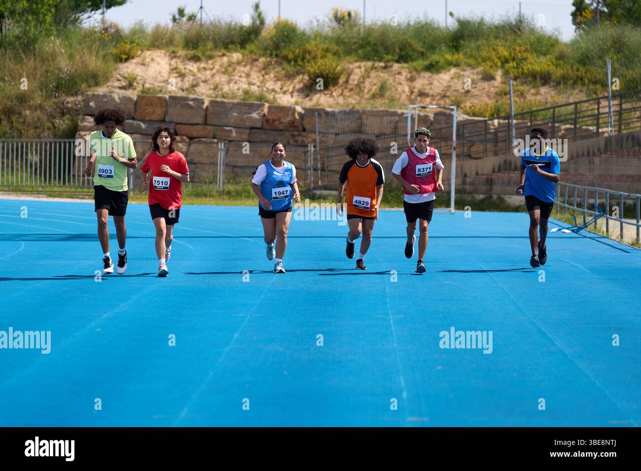 Six athletes running on hi-res stock photography and images - Alamy